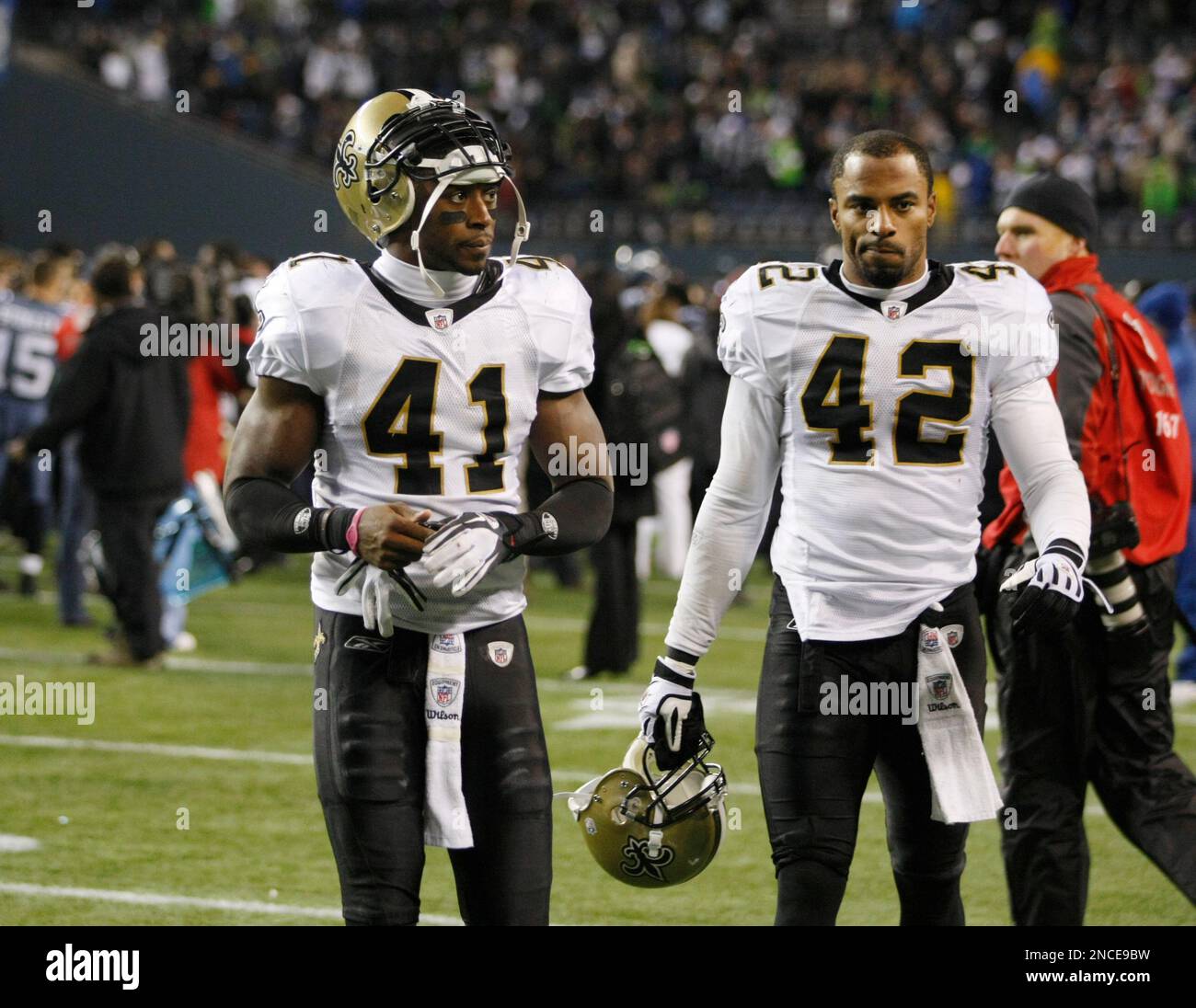 New Orleans Saints' Roman Harper (41) and Darren Sharper (42) walk off ...