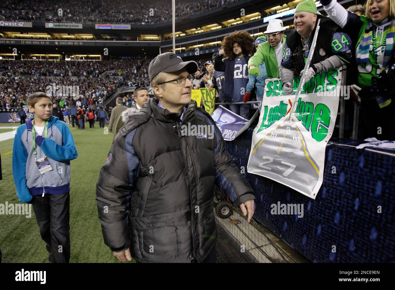 Seattle Seahawks owner Paul Allen looks toward the crowd near the end ...