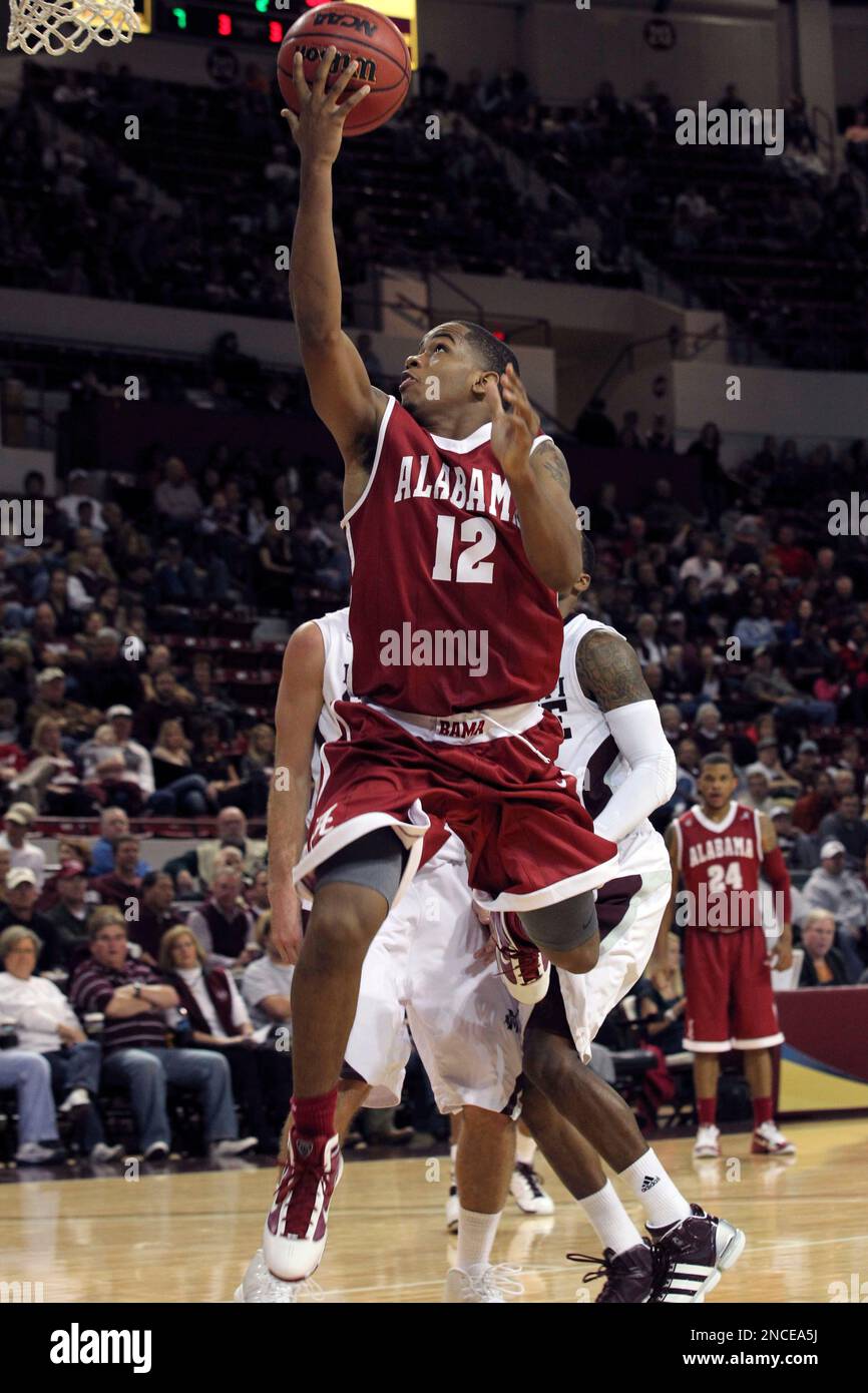 Alabama guard Trevor Releford (12) scores an uncontested layup against ...