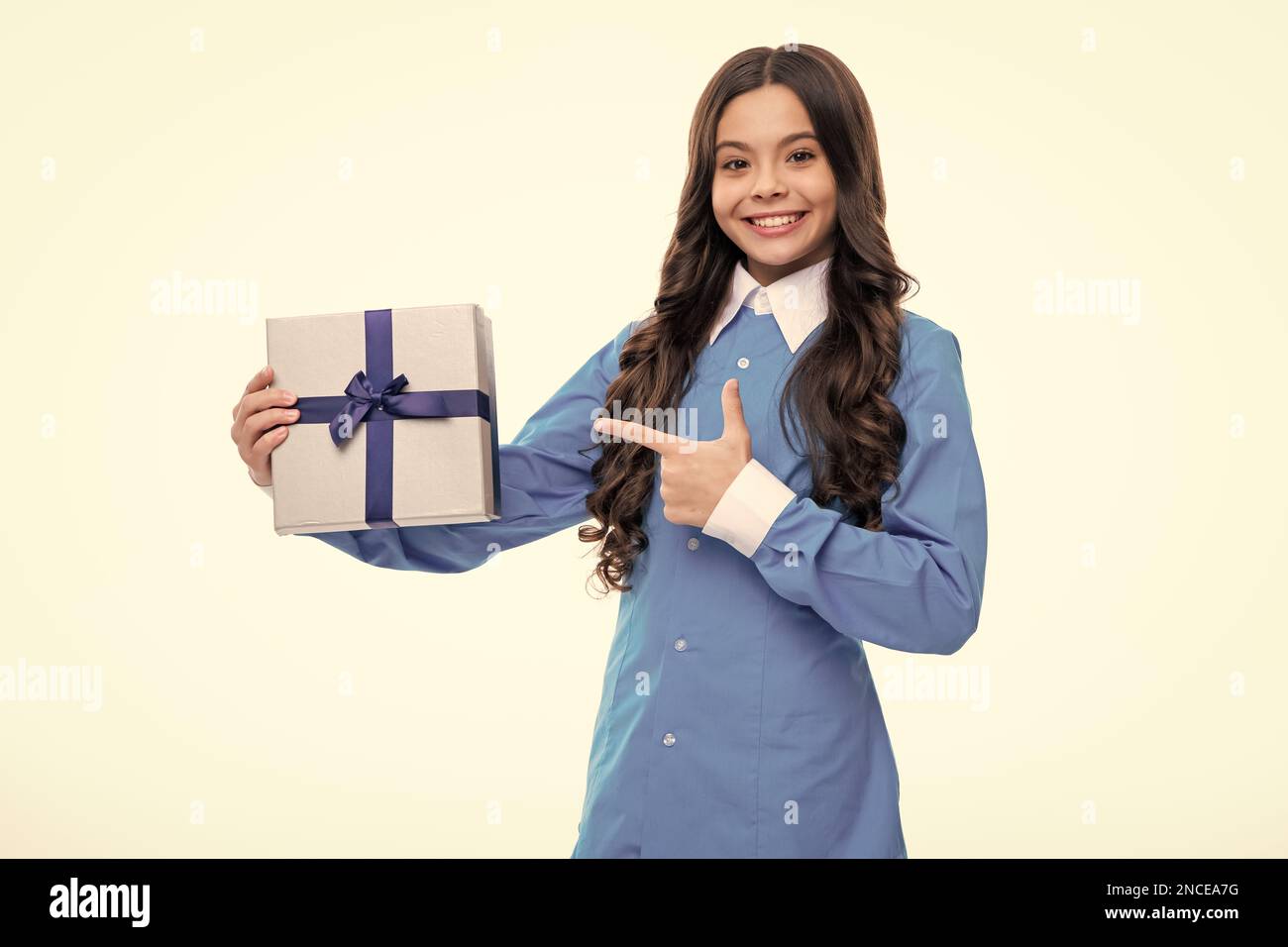 Teenager kid with present box. Teen child girl giving birthday gift ...