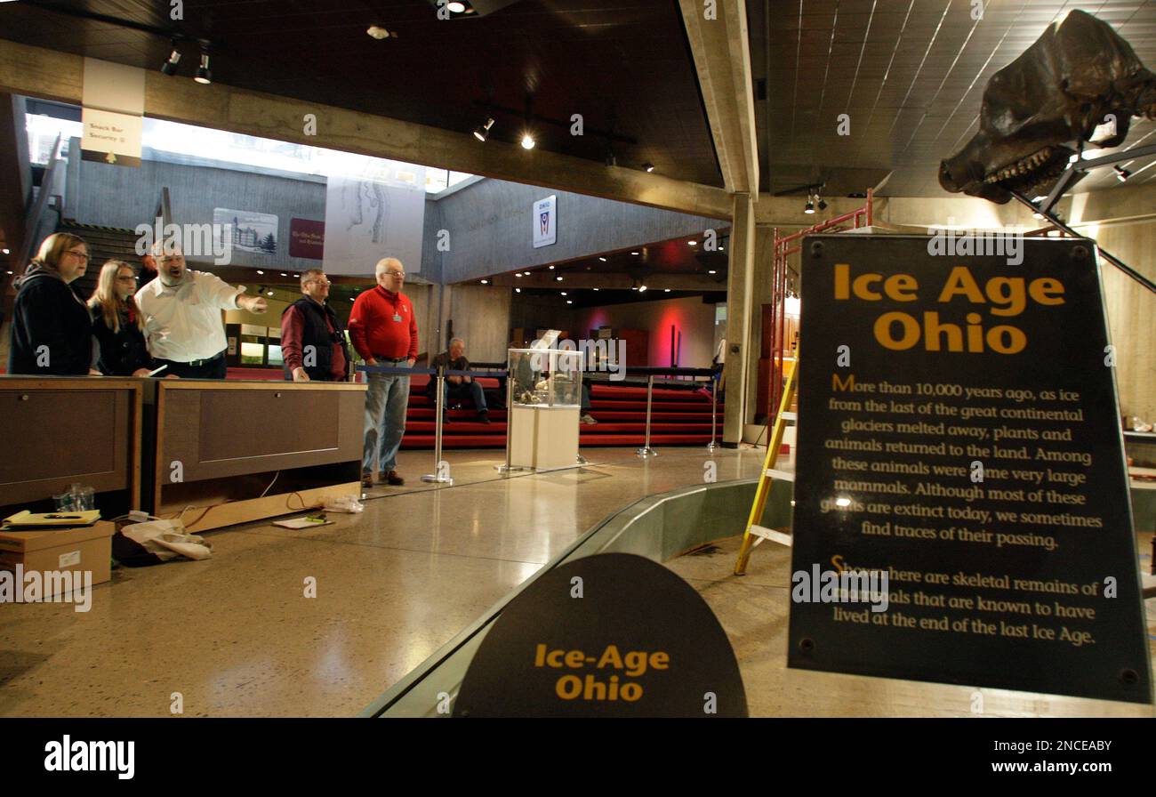 Visitors at the Ohio Historical Society look at the Conway Mastodon ...