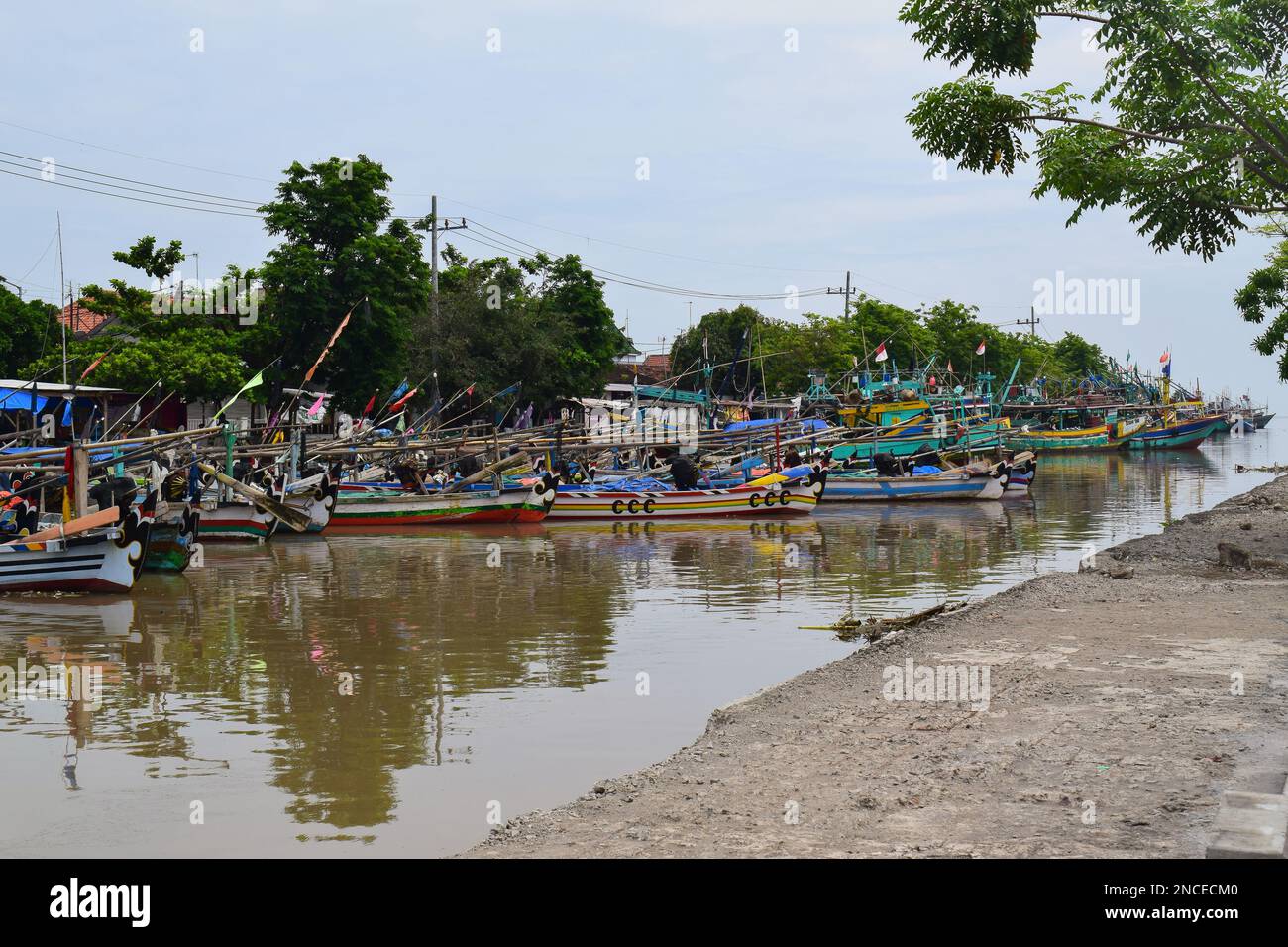 Traditional fishing boat in Pasuruan Indonesia harbor. on the island of ...
