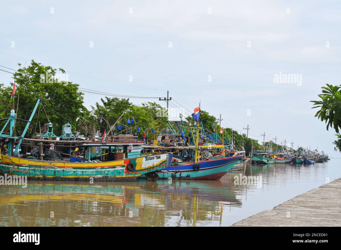 Traditional fishing boat in Pasuruan Indonesia harbor. on the island of ...