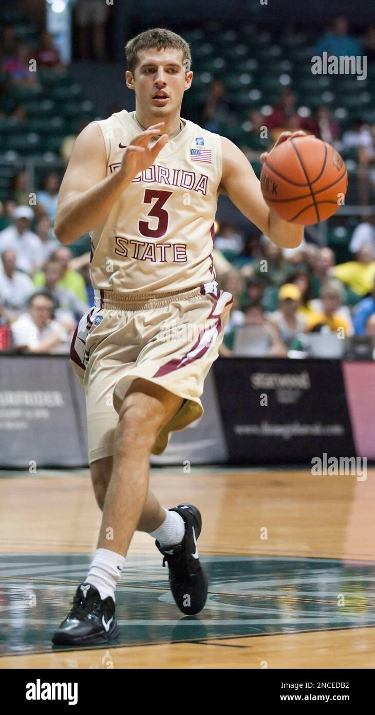 Florida State guard Luke Loucks (3) drives down the key in the second ...