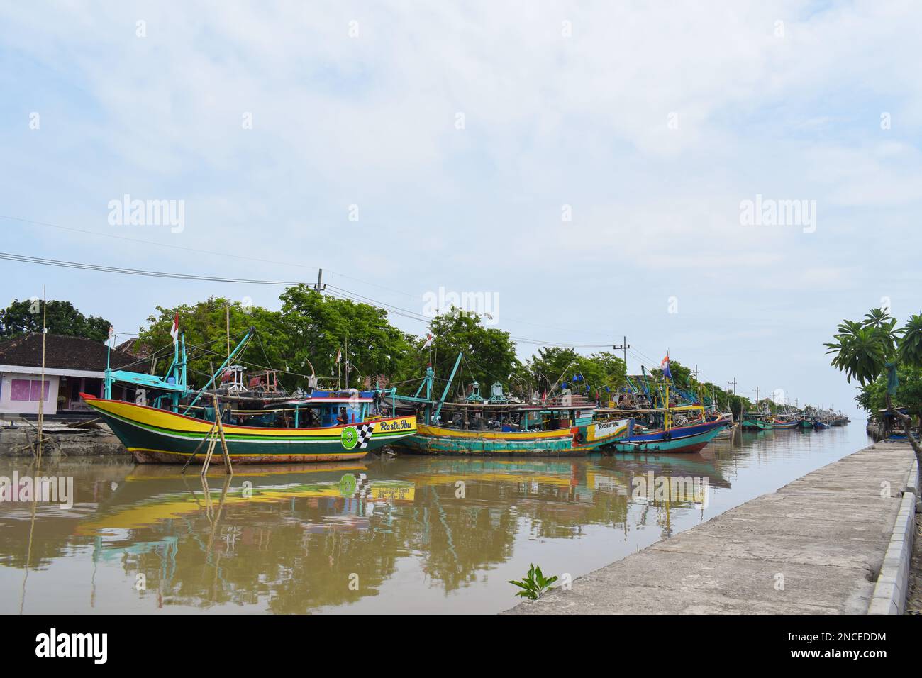 Traditional fishing boat in Pasuruan Indonesia harbor. on the island of ...