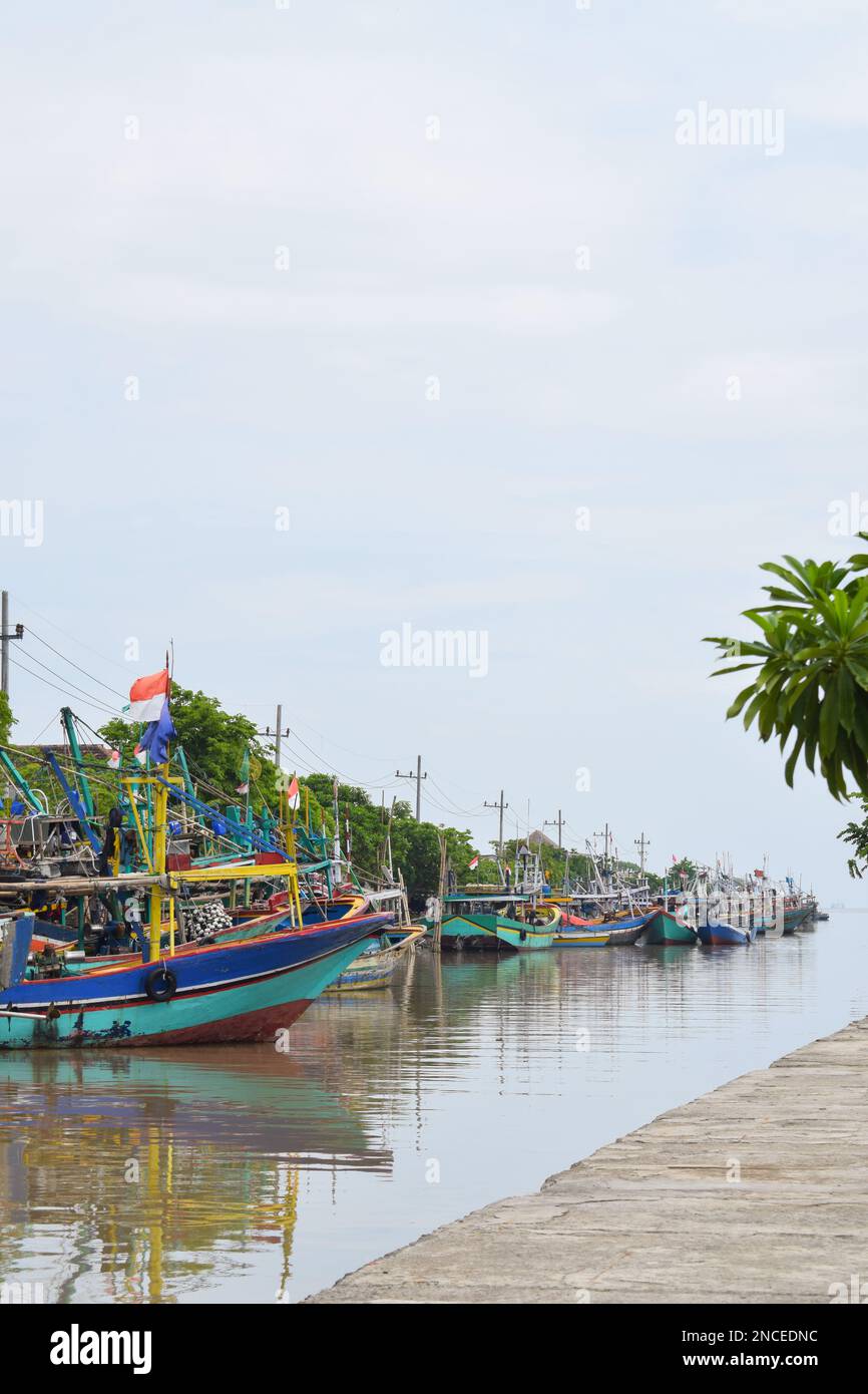 Traditional fishing boat in Pasuruan Indonesia harbor. on the island of ...