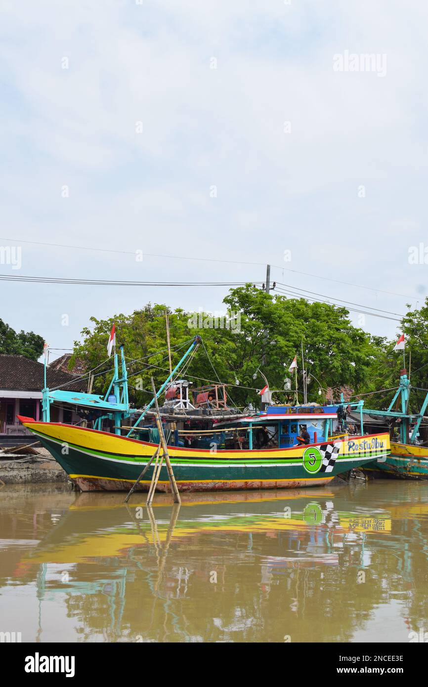 Traditional fishing boat in Pasuruan Indonesia harbor. on the island of ...