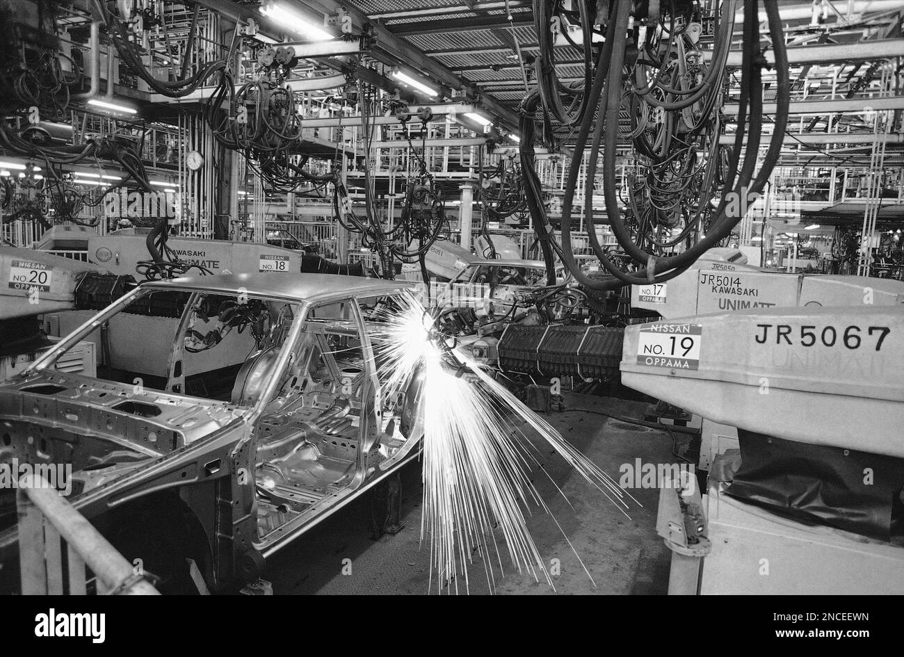 These industrious industrial robots on a Datsun automobile assembly ...