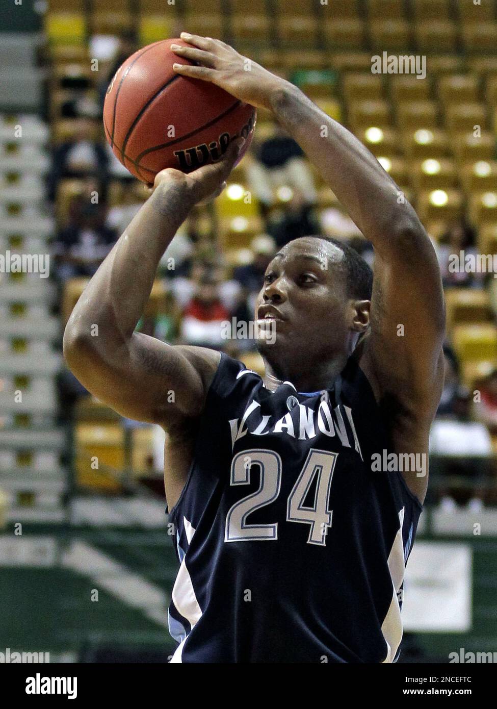 Villanova guard Corey Stokes (24) puts up a three point shot against ...