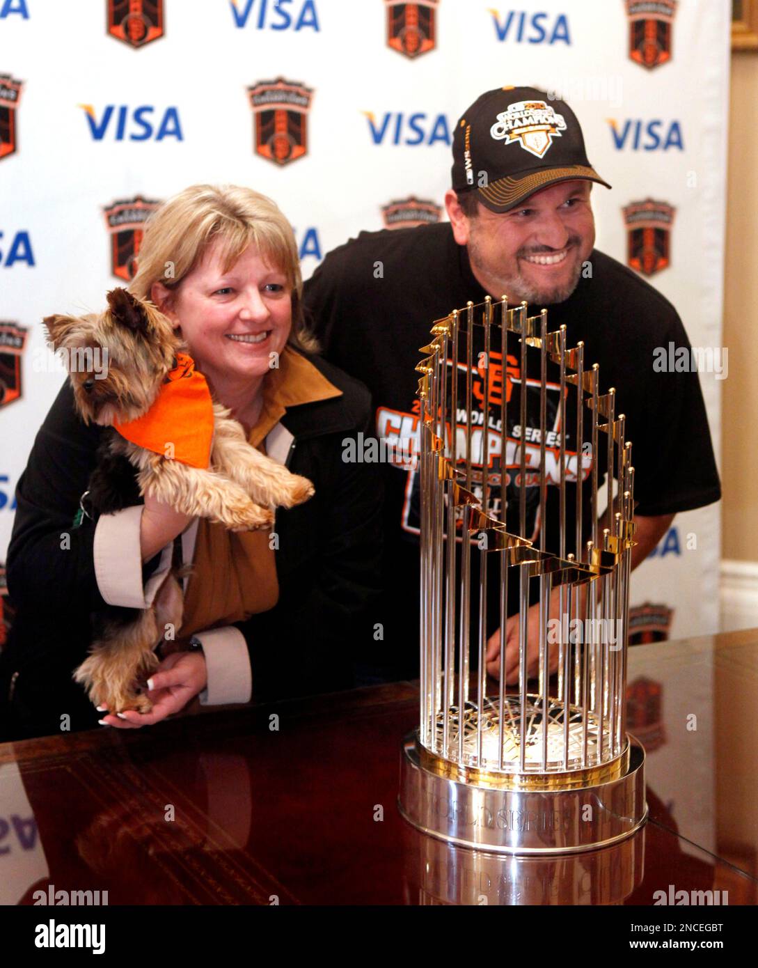 San Francisco Giants fans Shelli and Dan Moreno pose with their ...