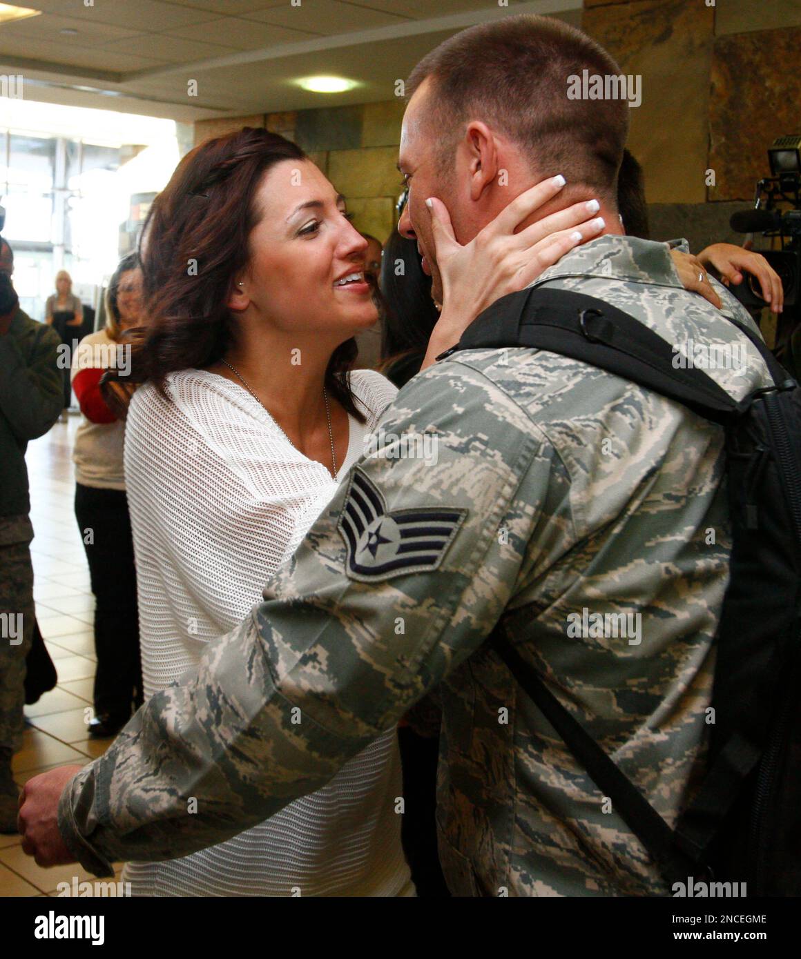 Danielle Eckstein, left, rushes to greet her boyfriend, Staff Sgt ...
