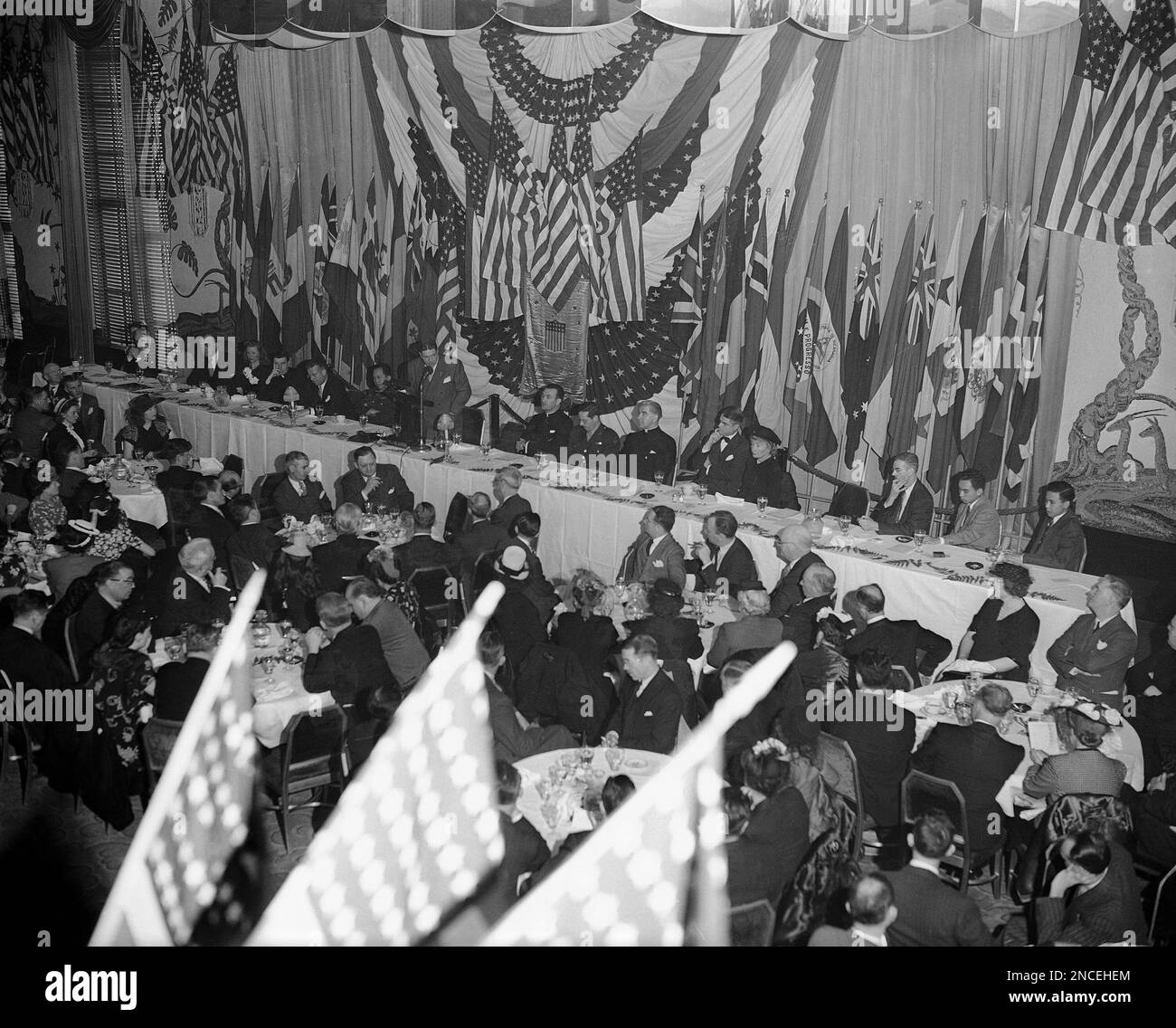 Edward A. Mahar (center of dais, at microphone), of the Catholic ...