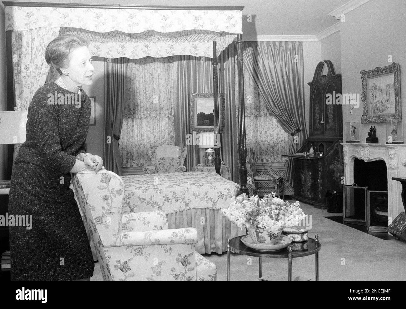 Mrs. Dorothy Rodgers poses by chair in her bedroom on Jan. 8, 1964. (AP ...