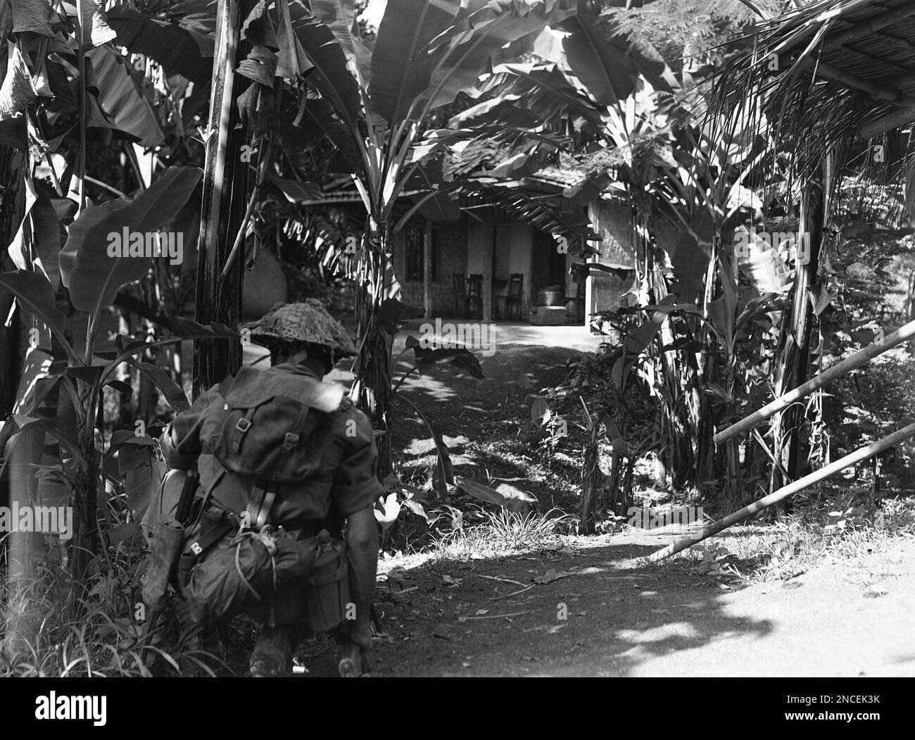 Soldiers and tanks of the Punjabi Regiment search the village of ...