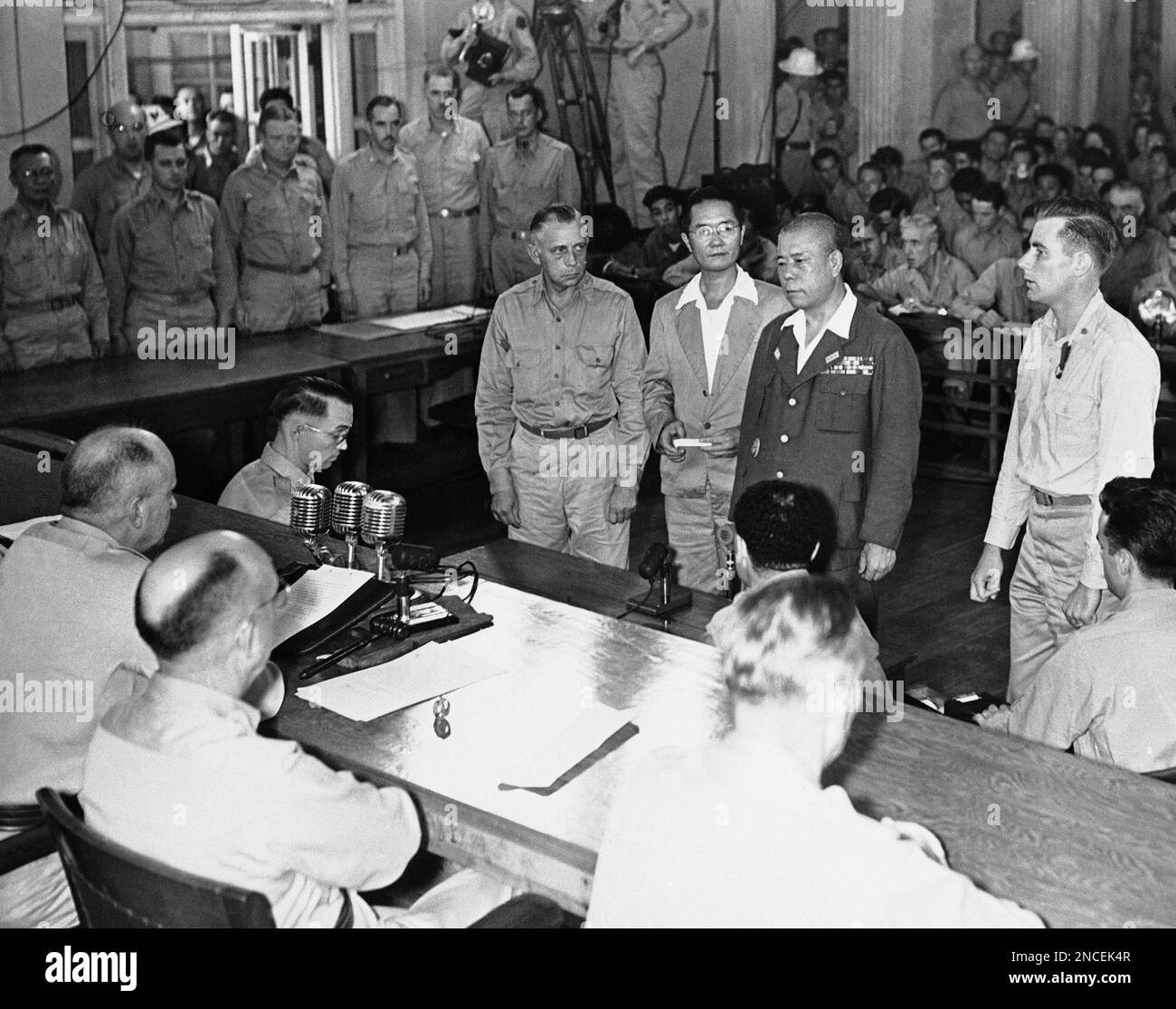 Lieutenant General Tomoyuki Yamashita, second from right, faces the ...