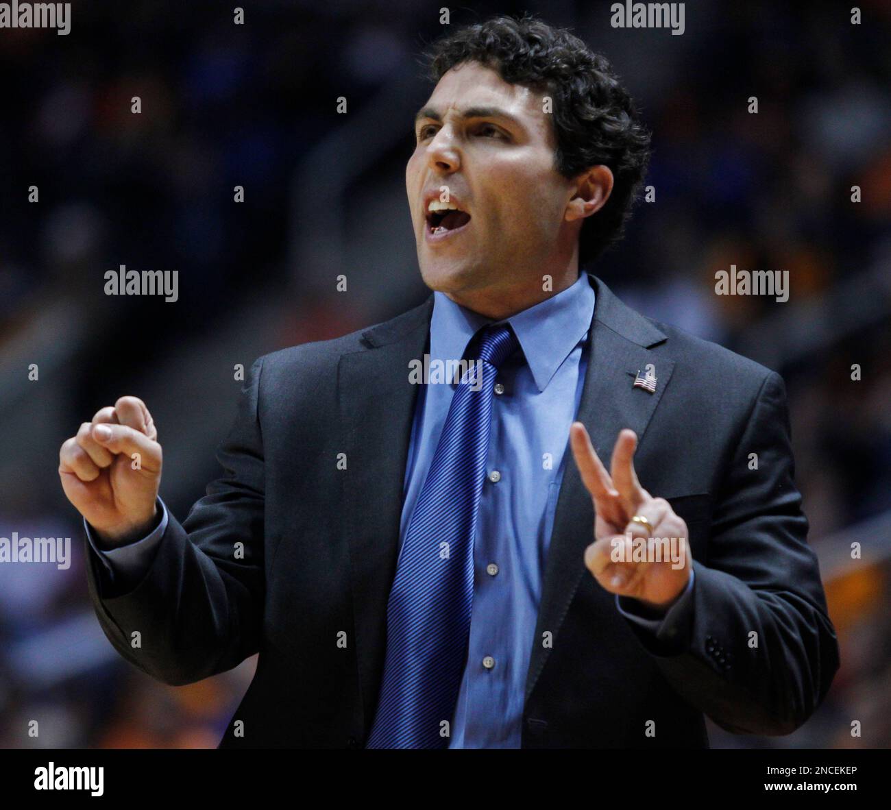 Memphis coach Josh Pastner yells to his team during the first half of ...
