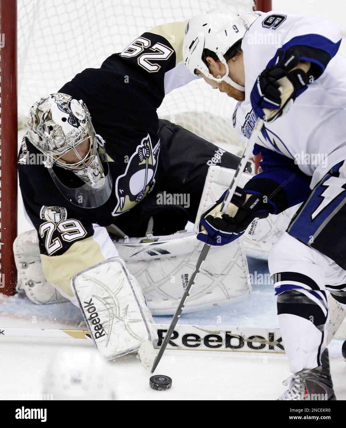 Pittsburgh Penguins goalie Marc-Andre Fleury (29) blocks a shot by ...