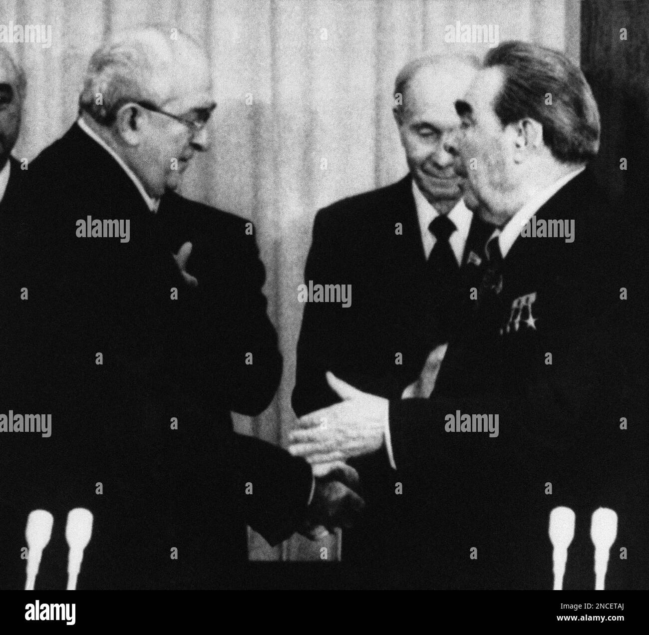 Soviet President Leonid Brezhnev, right, shaking hands with Yuri ...