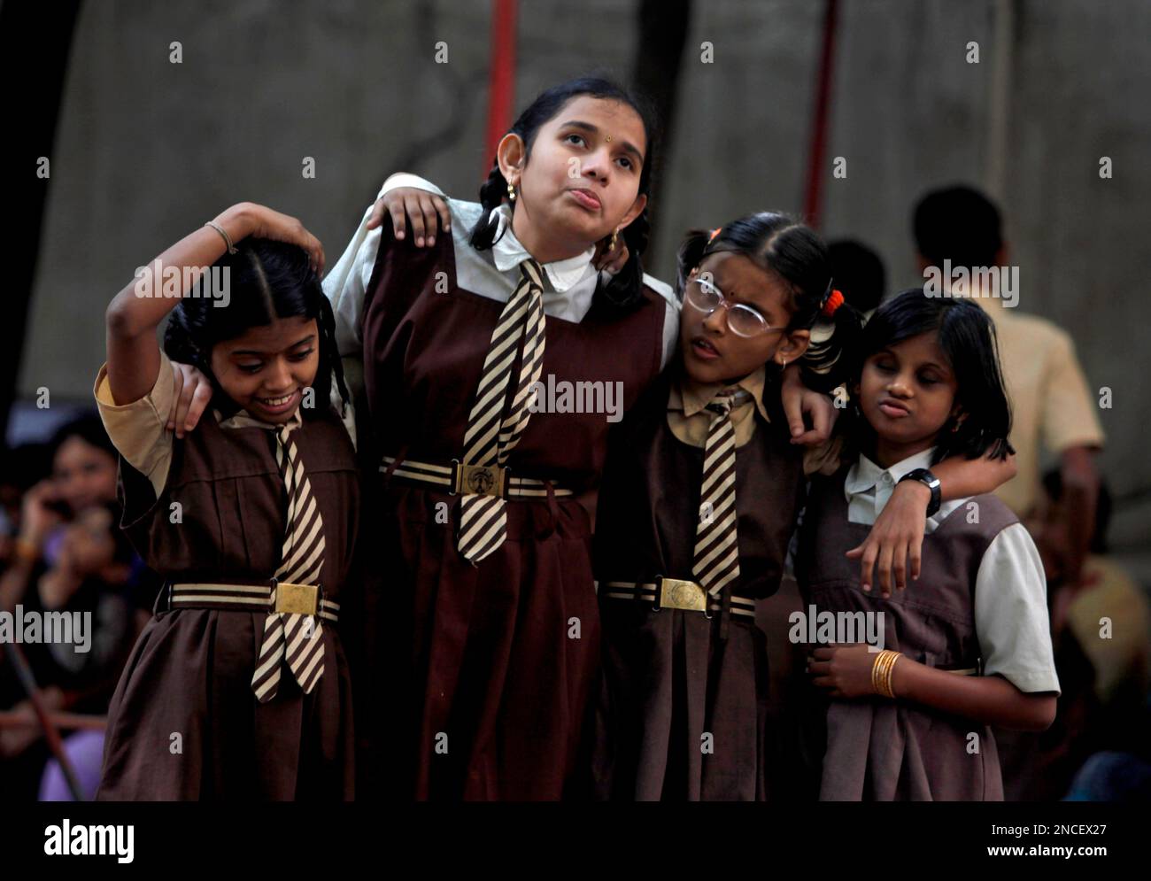 Indian students with visual disabilities walk together at the Devnar ...