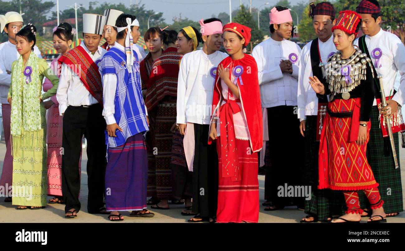 Clad in traditional costumes, delegates from Myanmar national races are ...