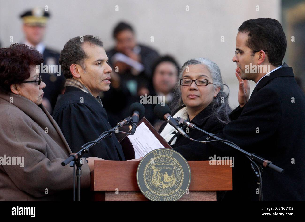 Newly-elected Providence, R.I., Mayor Angel Taveras, right, is ...