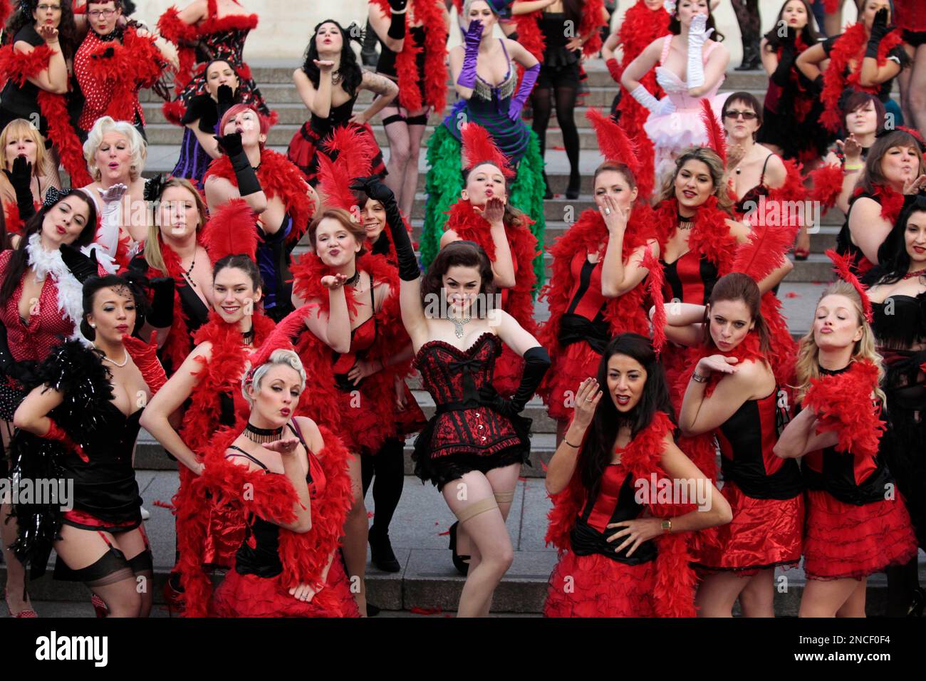 Kimberley Dunne, center, and other burlesque enthusiasts in outfits ...
