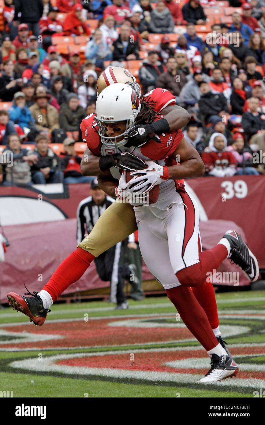 Arizona Cardinals wide receiver Larry Fitzgerald (11) scores in front ...