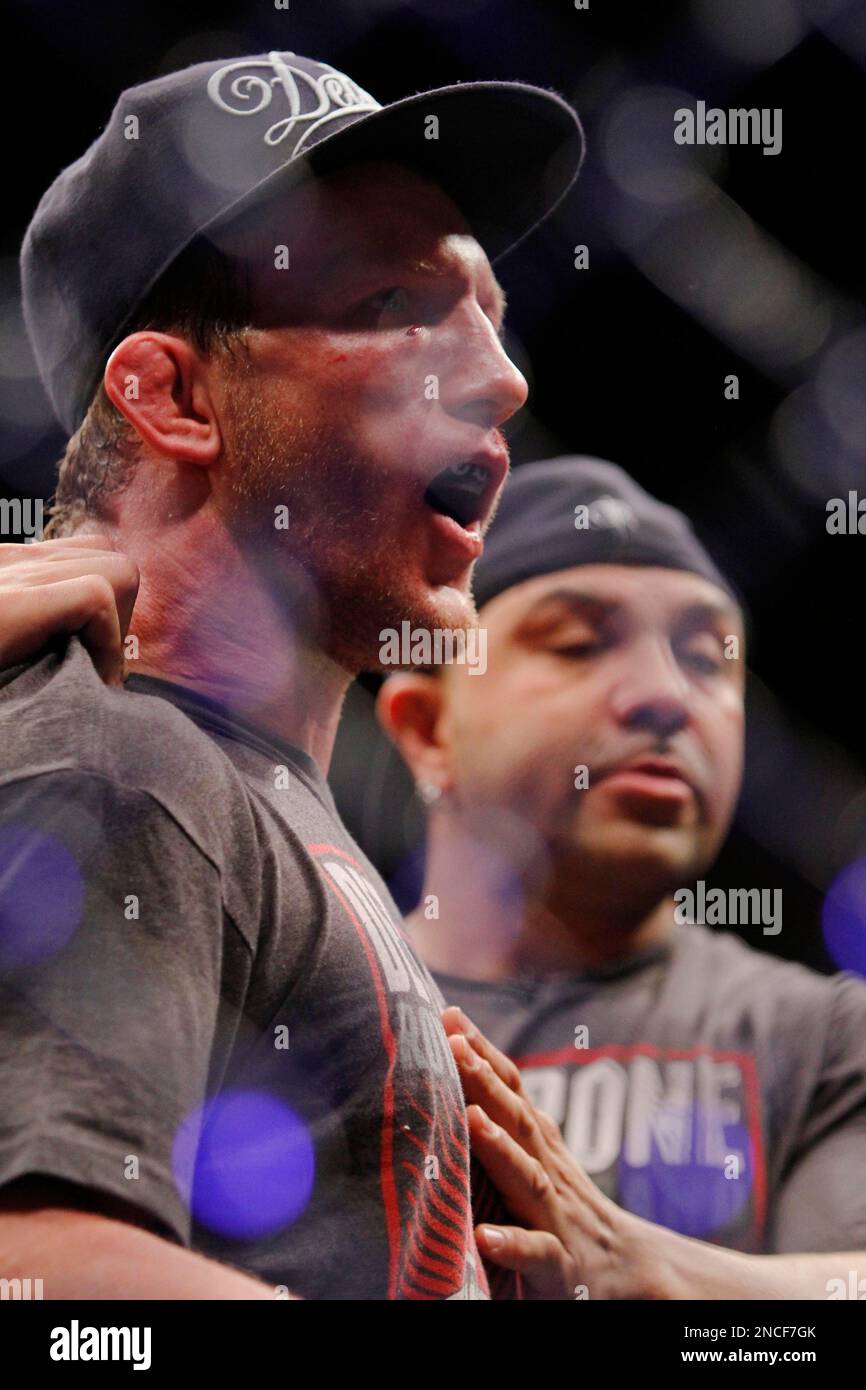 Gray Maynard reacts as his fight against Frankie Edgar is declared a ...