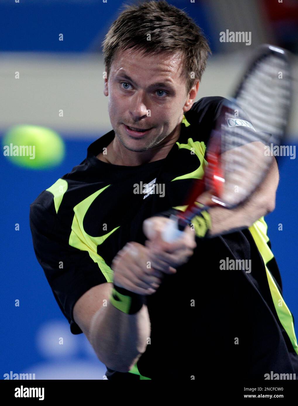 Robin Soderling from Sweden returns the ball to Jo-Wilfried Tsonga from ...
