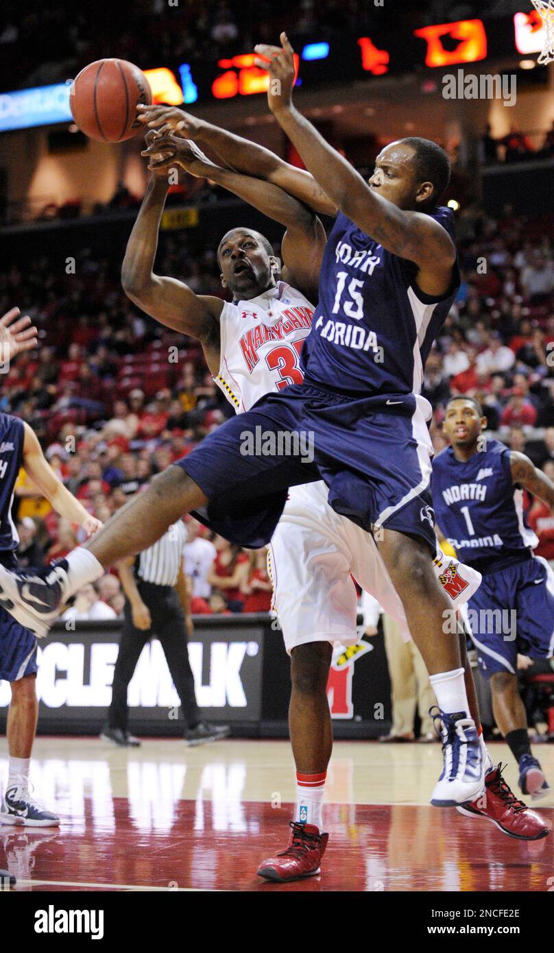Maryland forward James Padgett, left, battles for the ball against ...