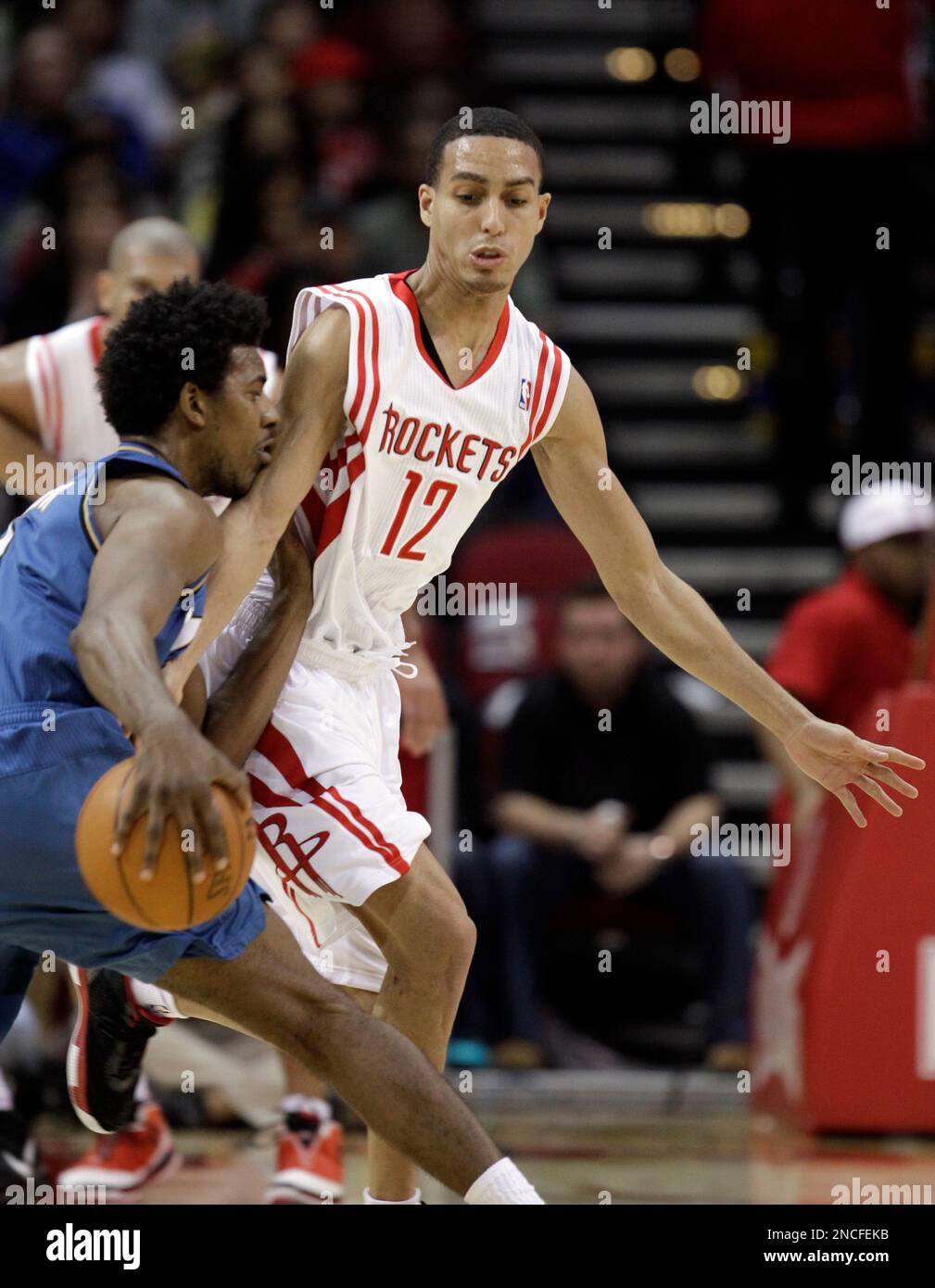 Houston Rockets' Kevin Martin (12) tries to steal the ball from ...