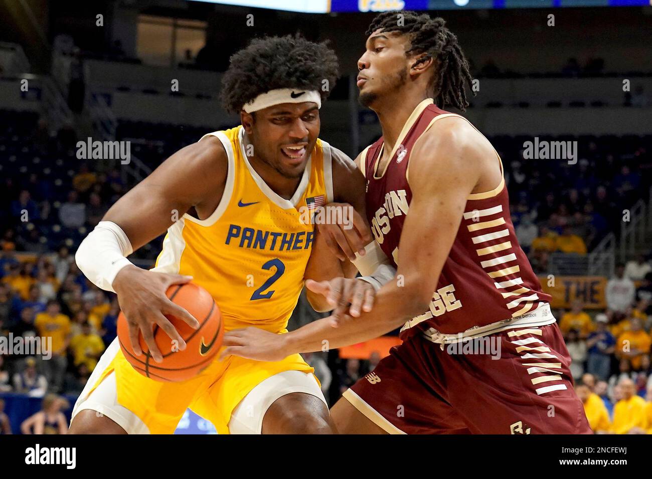 Pittsburgh forward Blake Hinson (2) drives against Boston College guard ...