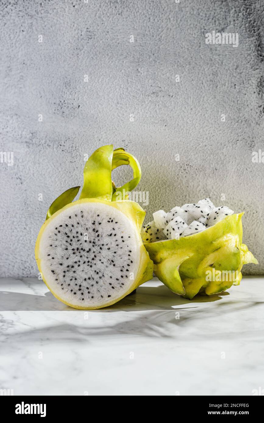 yellow pitahaya on a gray background. High quality photo Stock Photo ...