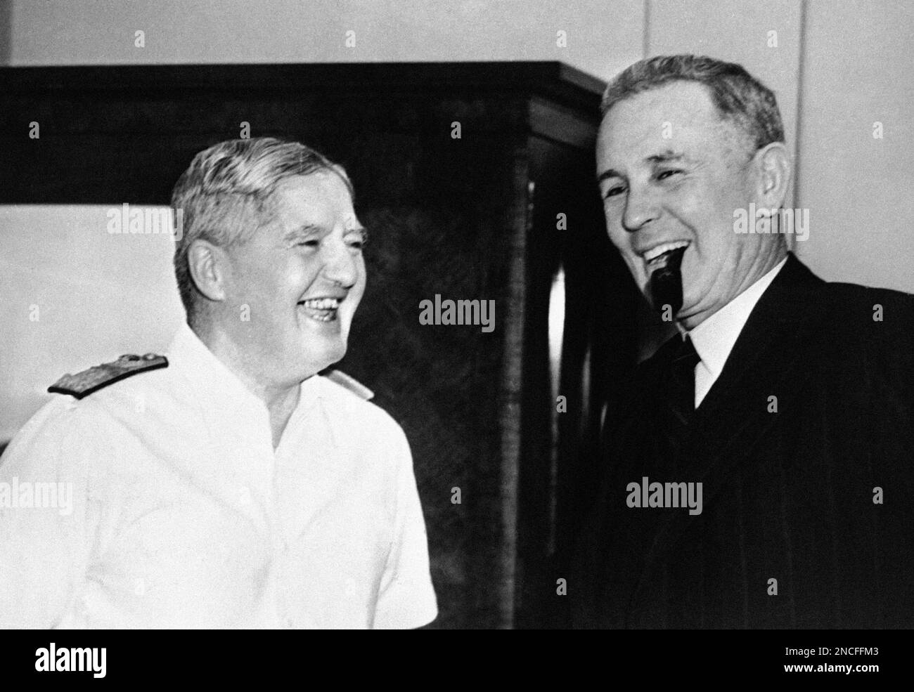 Australian Prime Minister Joseph Chifley, right, smiles, and his smile ...