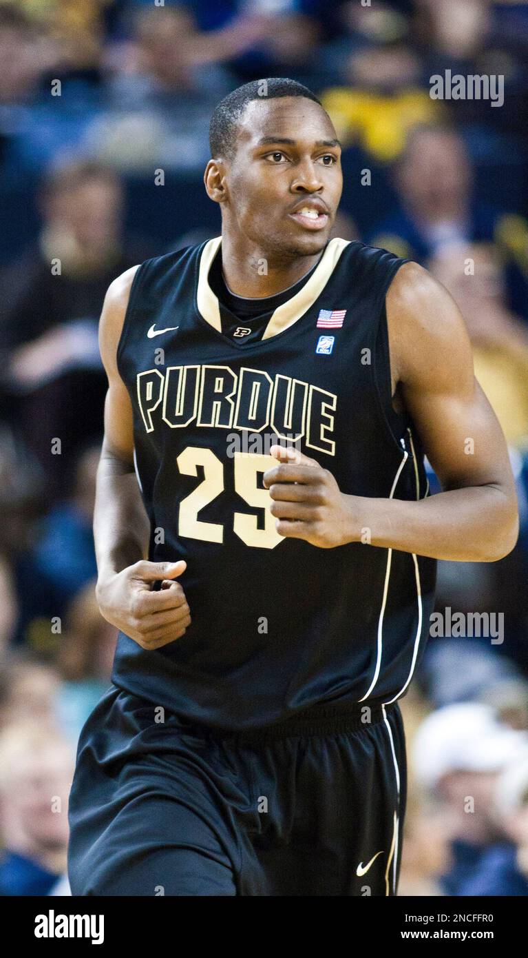 Purdue forward JaJuan Johnson (25) reacts after scoring a basket in the ...