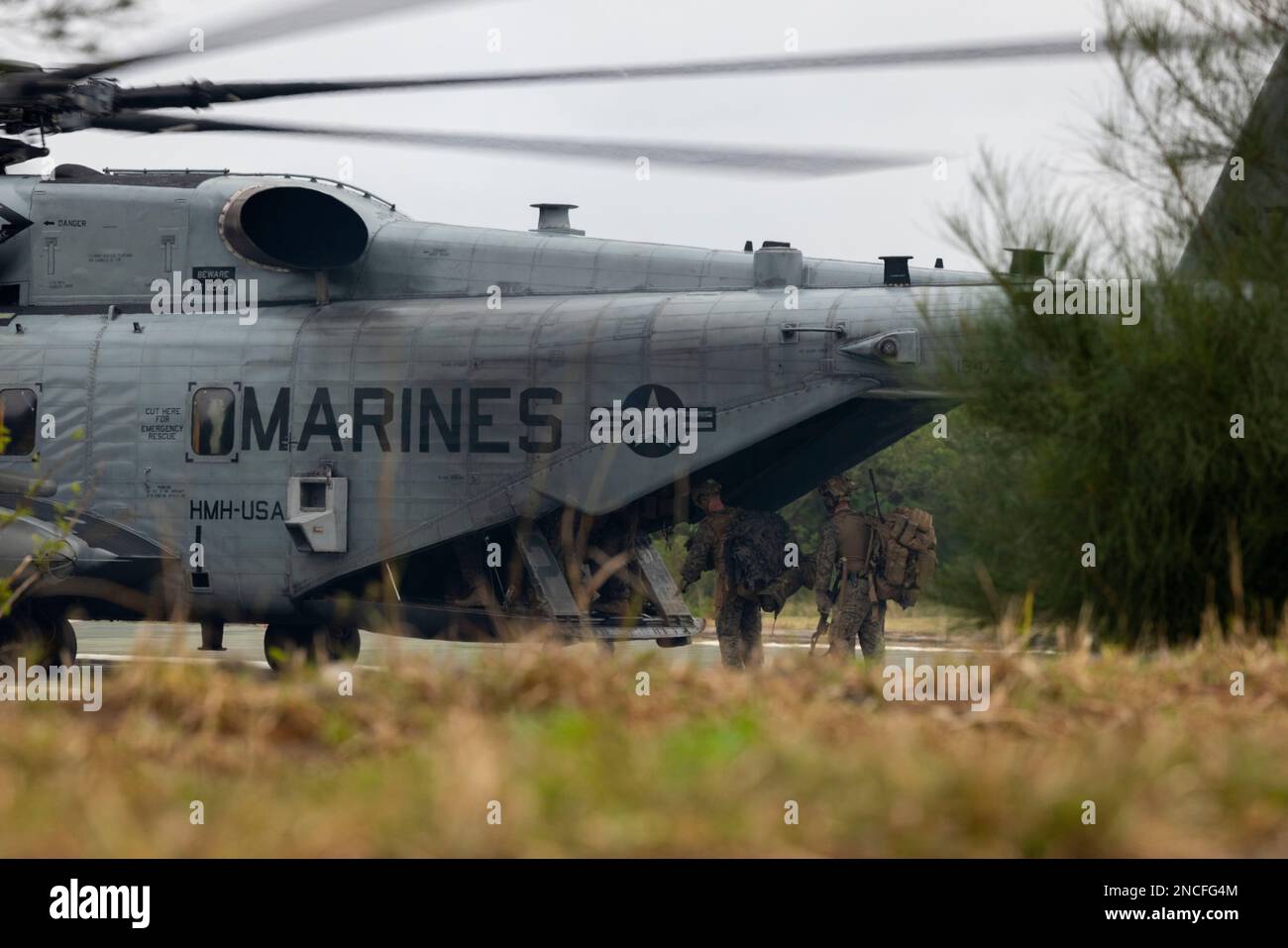 U.S. Marines with 3rd Battalion, 4th Marines board a CH-53E Super ...