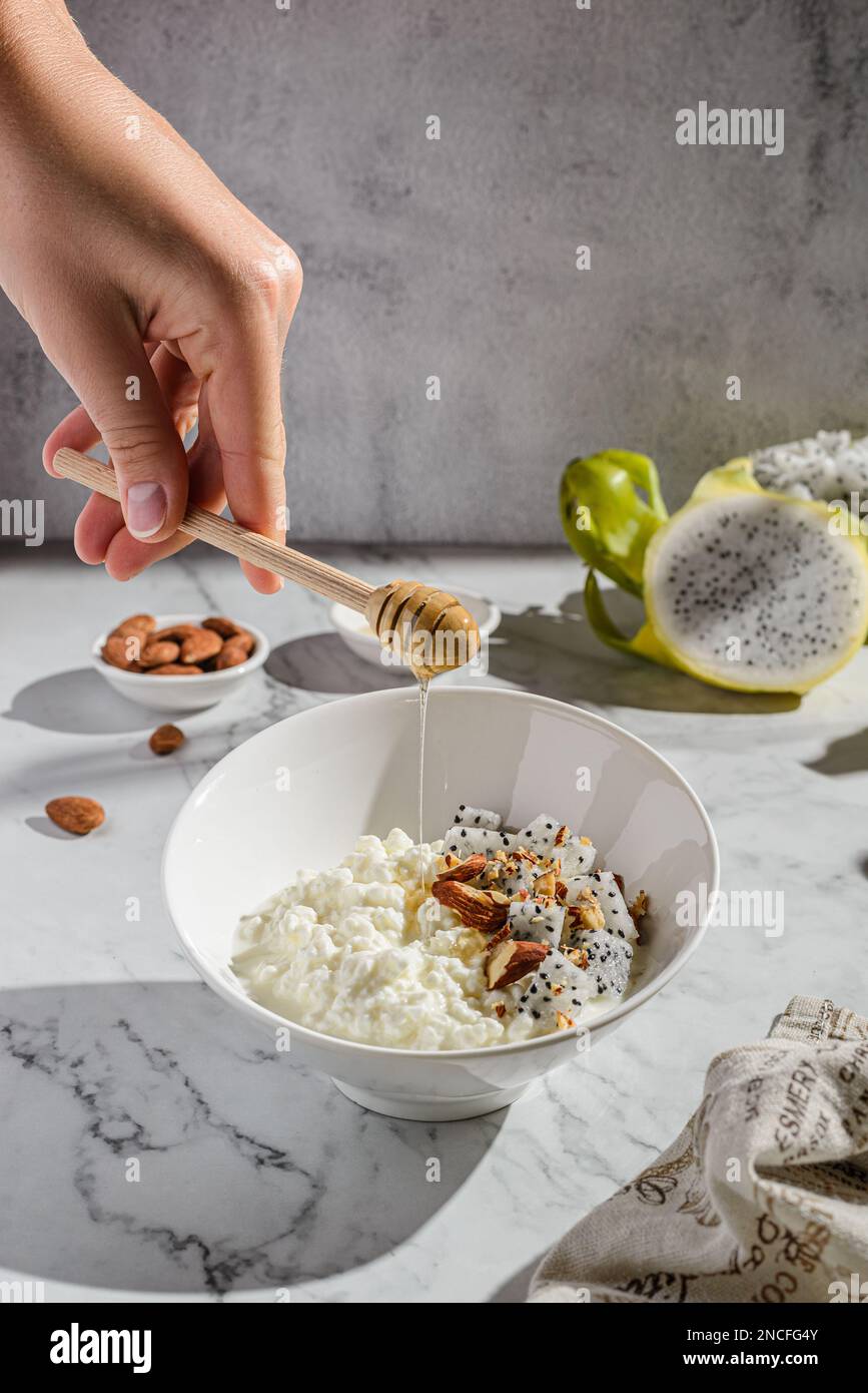 cottage cheese with almonds and pitahaya Stock Photo - Alamy