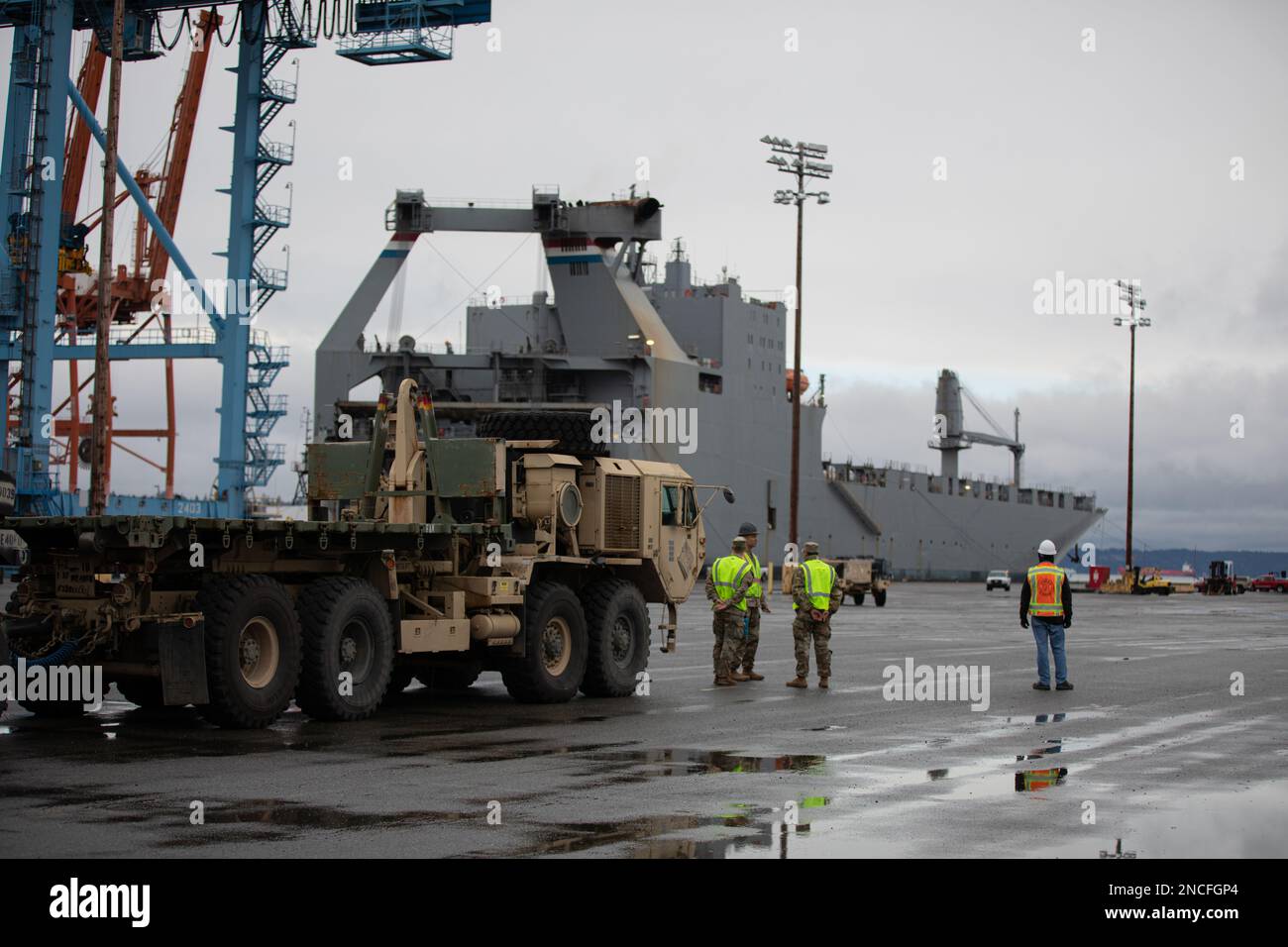 Soldiers attached to the 833rd Transportation Battalion stationed at ...