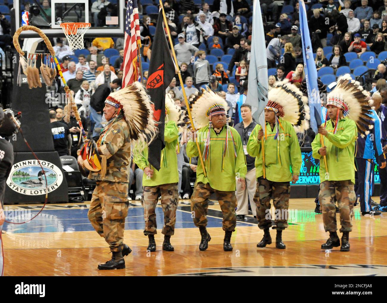 Native American color guard prior to the start of an NBA basketball ...