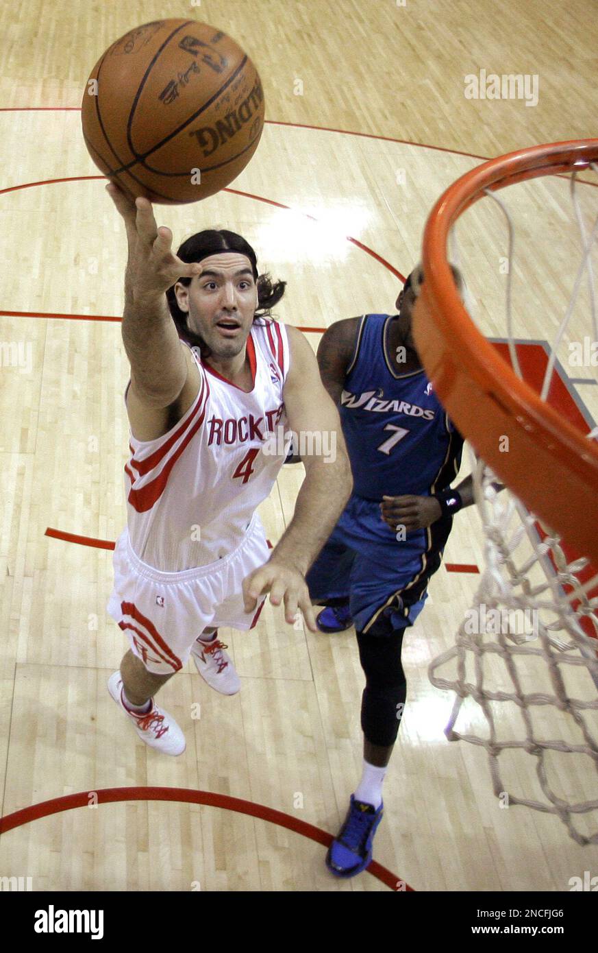 Houston Rockets' Luis Scola (4), of Argentina, shoots as Washington ...