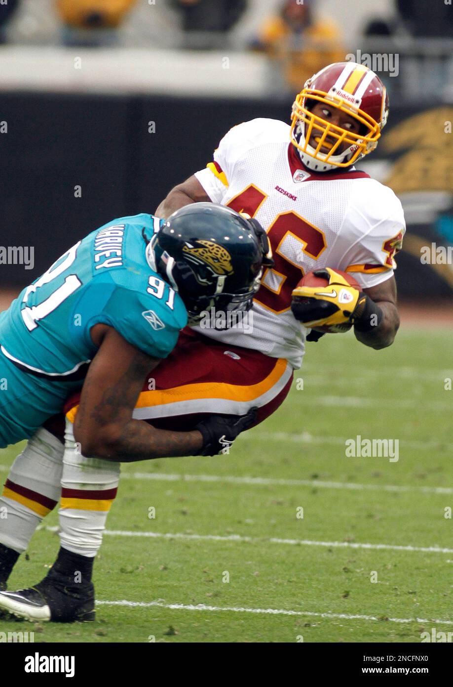 Jacksonville Jaguars defensive end Derrick Harvey (91) hits Washington ...
