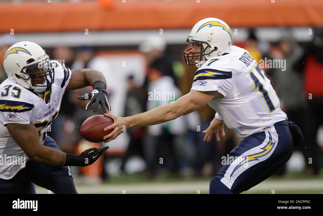 San Diego Chargers quarterback Philip Rivers (17) hands off to fullback ...