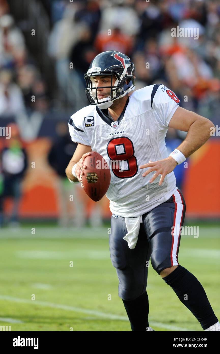 Houston Texans quarterback Matt Schaub (8) scrambles with the football ...