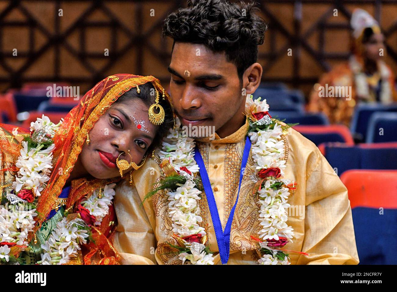 Kolkata, India. 14th Feb, 2023. A couple prepares for the Mass Marriage ceremony rituals. An NGO ...