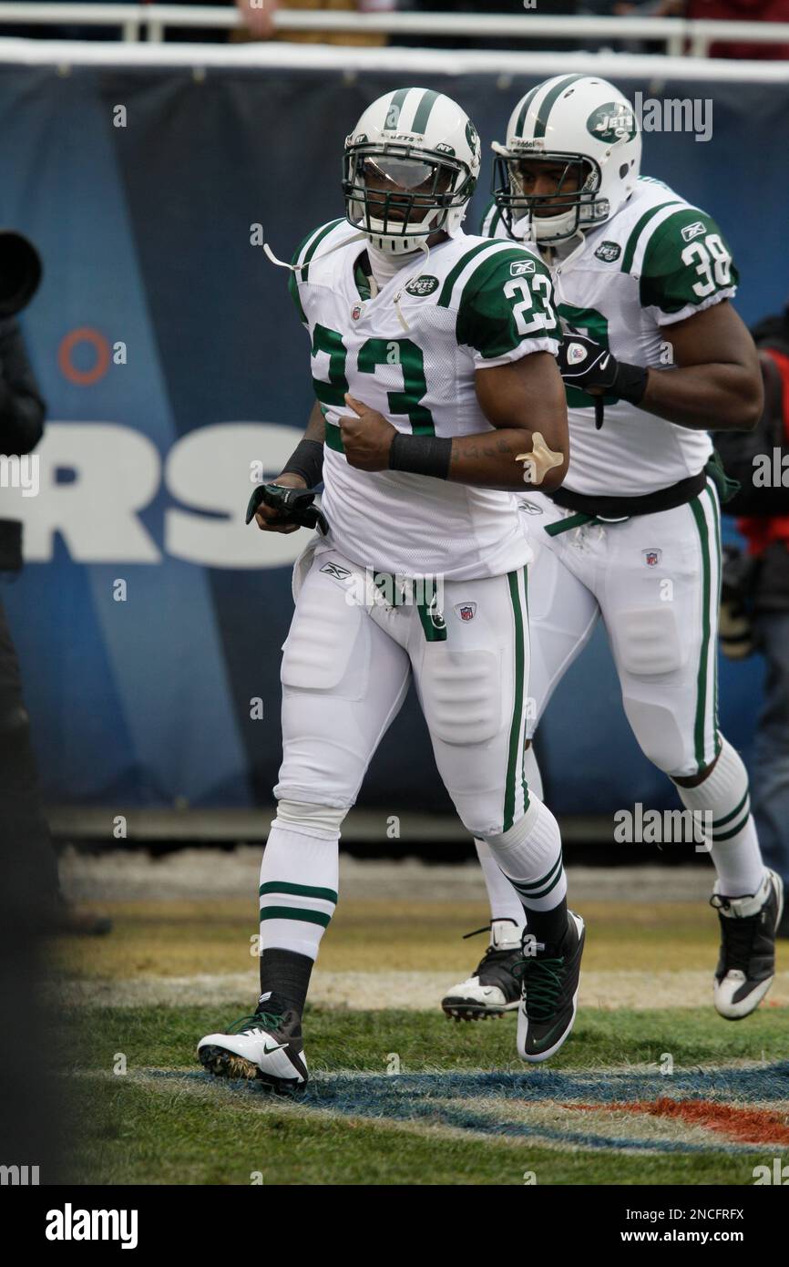 New York Jets' Shonn Greene, left, and John Conner, right, run on the ...