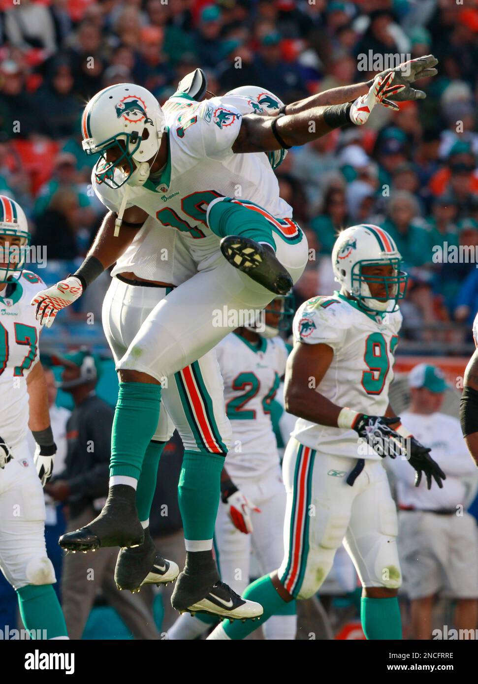 Miami Dolphins wide receiver Roberto Wallace (18) celebrates with a ...