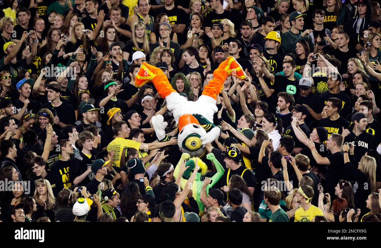 FILE - This Oct. 2, 2010, file photo, shows fans passing the Oregon ...