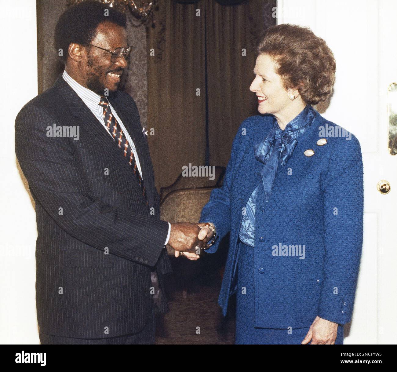 British Premier Margaret Thatcher greets Chief Gatsha Buthelezi, South ...