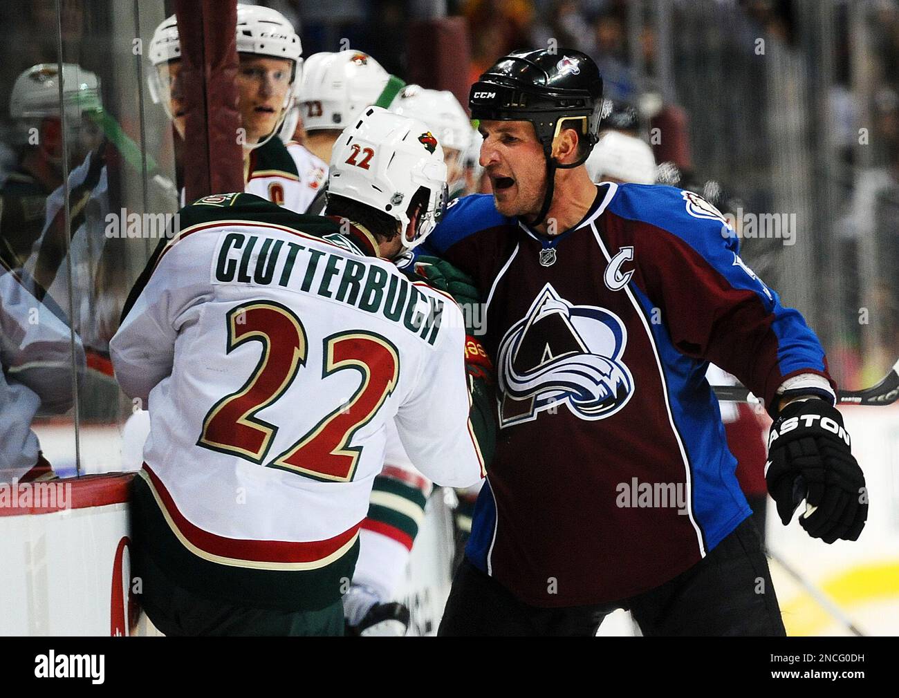 Colorado Avalanche defenseman Adam Foote, right, yells at Minnesota ...