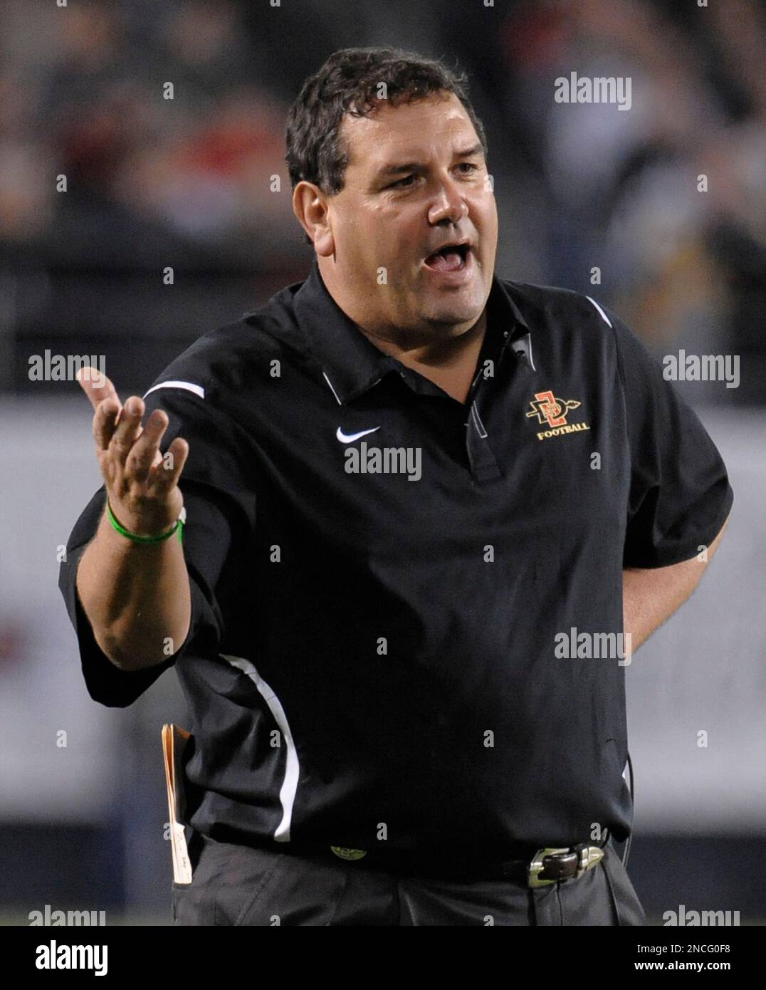 San Diego State coach Brady Hoke tries to communicate during the first ...